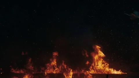 Flying doves over fire flames. Fire flam... | Stock Video | Pond5