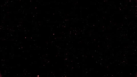 Flying glitter dust particles on alpha b... | Stock Video | Pond5