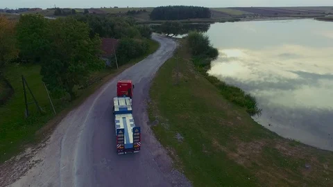 Flying high above freight semi truck tra... | Stock Video | Pond5
