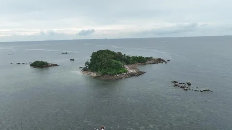 Flying to Manjin Besar Island, Lagoi Bay... | Stock Video | Pond5