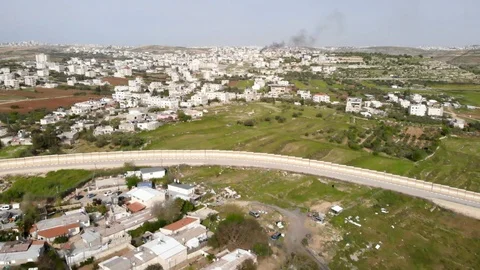 Flying over Israel Palestinian wall | Stock Video | Pond5