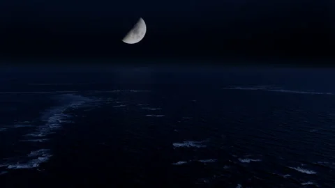 Flying over ocean at night with moon in ... | Stock Video | Pond5