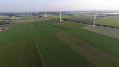 Flying up to row of windmills (wind turb... | Stock Video | Pond5