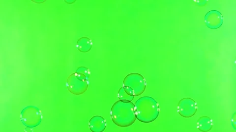 flying soap bubbles on green screen back... | Stock Video | Pond5