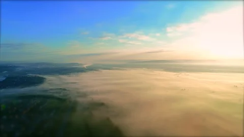 Flying through dense fog above city. 4K | Stock Video | Pond5