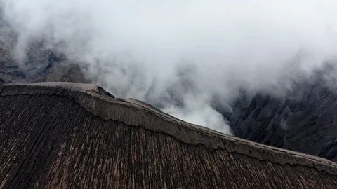 Flying towards volcano revealing its act... | Stock Video | Pond5