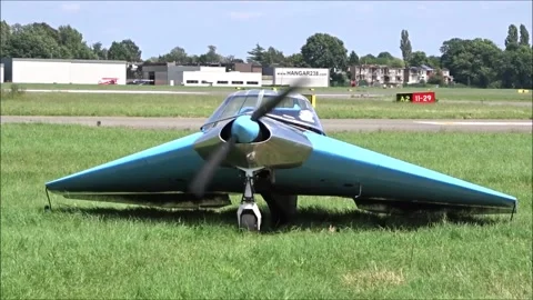 Flying wing plane starting up its engine... | Stock Video | Pond5