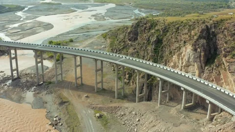 Flyover with highway bridge spanning acr... | Stock Video | Pond5