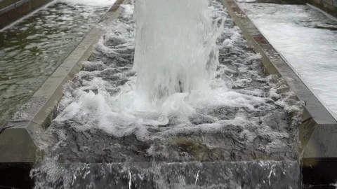 Foamy streams of water rise and fall. Al... | Stock Video | Pond5