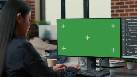 Focus on computer screen with green scre... | Stock Video | Pond5