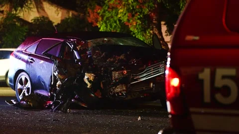 Focus pull of a crashed car at a night a... | Stock Video | Pond5