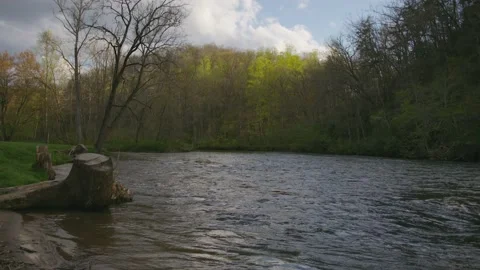 Focus pull onto a running stream of wate... | Stock Video | Pond5