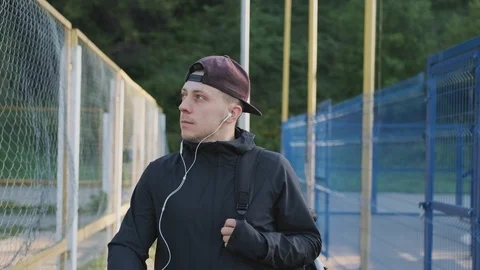 Focused young man walking for training i... | Stock Video | Pond5