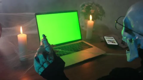 In fog scary character of death, typing ... | Stock Video | Pond5