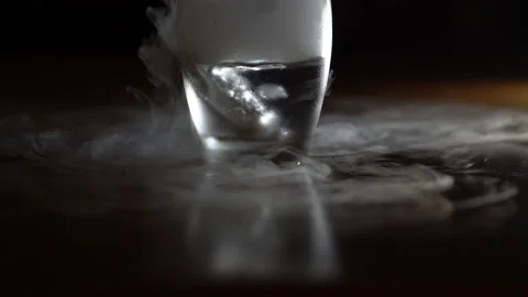 fog from water with dry ice in a glass. ... | Stock Video | Pond5