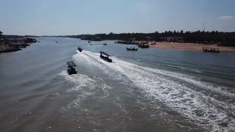 Follow back fishing boats back to fishin... | Stock Video | Pond5