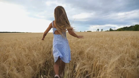 Follow to cute happy child in dress runn... | Stock Video | Pond5