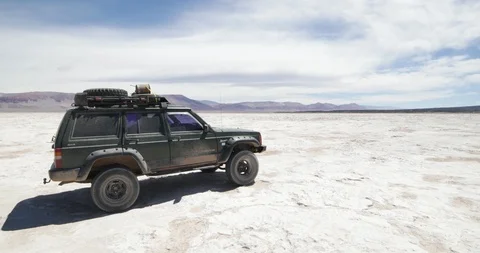 Following 4x4 driving off road over whit... | Stock Video | Pond5