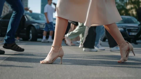 Following female feet steps crossing bus... | Stock Video | Pond5