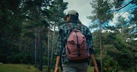 Following shot from back woman walk in f... | Stock Video | Pond5