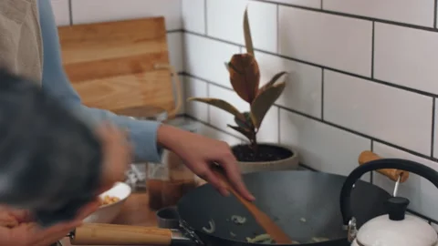 Food, cooking and couple in a kitchen, b... | Stock Video | Pond5