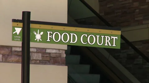 Food court sign with escalator in backgr... | Stock Video | Pond5