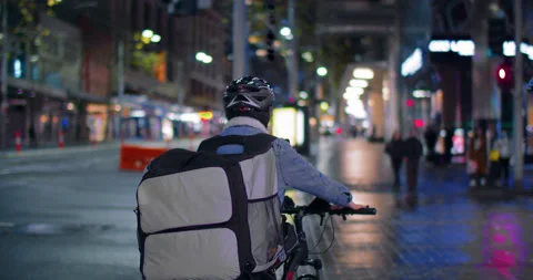 Food Delivery Rider On Bike Waiting To C... | Stock Video | Pond5