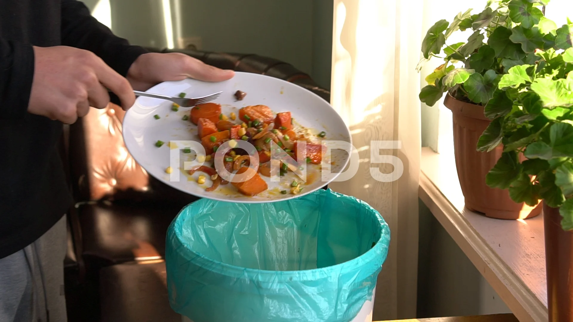 Throwing Food In Garbage