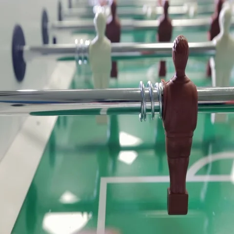 Foosball match with white and red figure... | Stock Video | Pond5