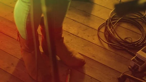 Foot Tapping Female Singer with Flashing... | Stock Video | Pond5