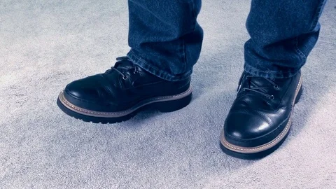 Foot tapping impatiently high angle | Stock Video | Pond5