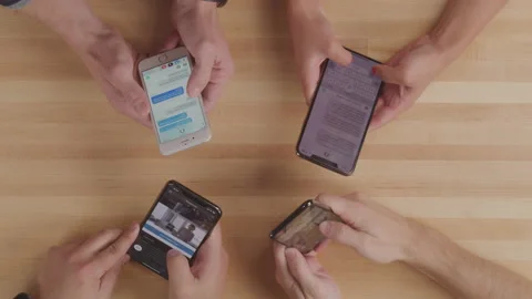 Footage From Above of Four Sets of Hands... | Stock Video | Pond5