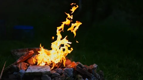 Footage of a Campire in the Evening with... | Stock Video | Pond5