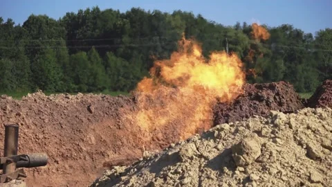 Footage of field with fire on background... | Stock Video | Pond5