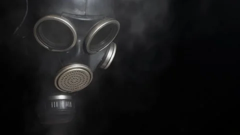footage of gas mask smoke dark backgroun... | Stock Video | Pond5