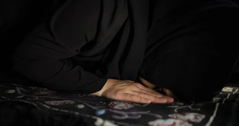 Footage of a Muslim woman praying salah,... | Stock Video | Pond5