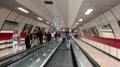 Footage of people walking on moving walk... | Stock Video | Pond5