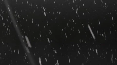 Footage of snow falling isolated on a bl... | Stock Video | Pond5