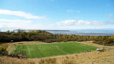 A football field on the shore of the bay... | Stock Video | Pond5