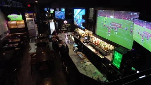 Watching Tv In A Sports Bar Stock Videos – Royalty-Free HD & 4K Videos