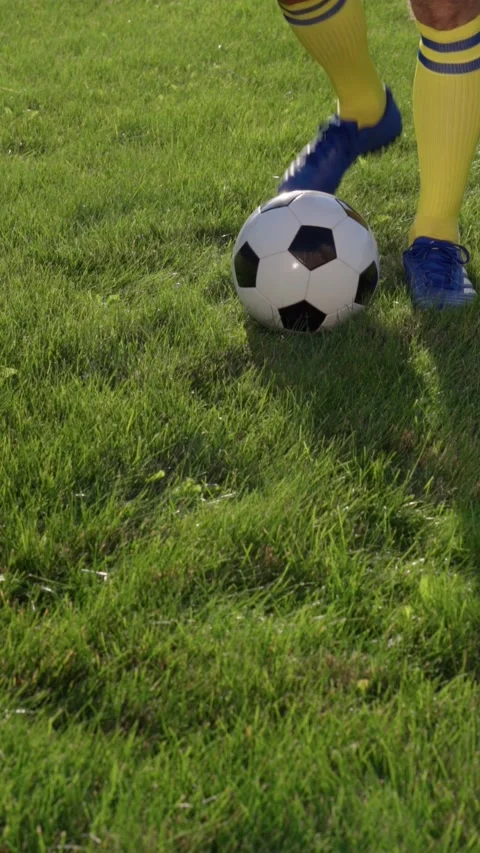 Football Player Kicks Ball His Feet, Clo... | Stock Video | Pond5