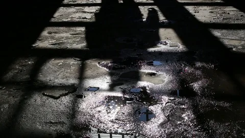 Footsteps of a man slowly moving towards... | Stock Video | Pond5