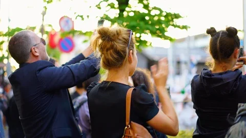 foreigner clapping and watching a crowd ... | Stock Video | Pond5