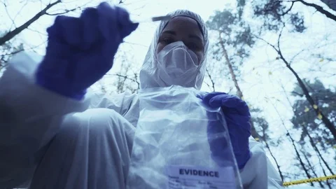 Forensic lab expert collecting evidence ... | Stock Video | Pond5