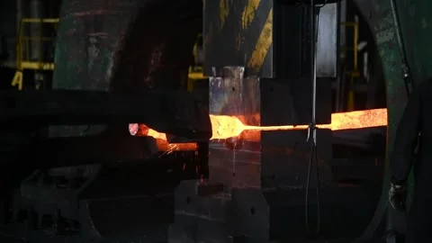 Forging a large hot metal billet with an... | Stock Video | Pond5