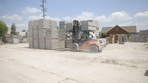 Forklift Lifting Cinder Blocks | Stock Video | Pond5