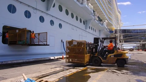 Forklift loading luggage in cruise ship ... | Stock Video | Pond5