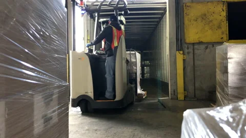 Forklift Operator Loads Trailer at Shipp... | Stock Video | Pond5