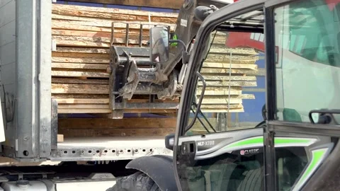 Forklift Uploads Heavy Truck With Wood B... | Stock Video | Pond5