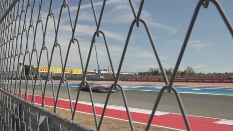 Formula 1 F1 race cars speeding around a... | Stock Video | Pond5